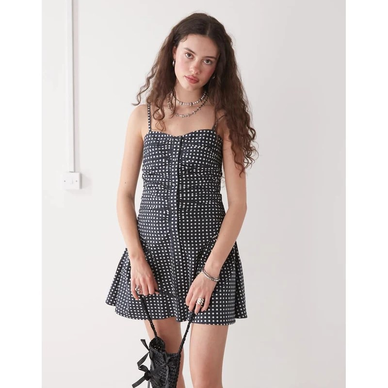 Reclaimed Vintage dropped waist mini sun dress in navy and white polka ...
