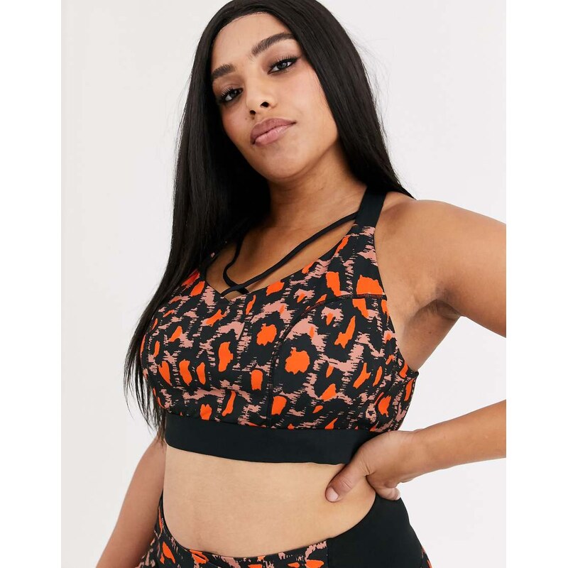 Wolf & Whistle curve leopard print sports bra with cross detail back in ...